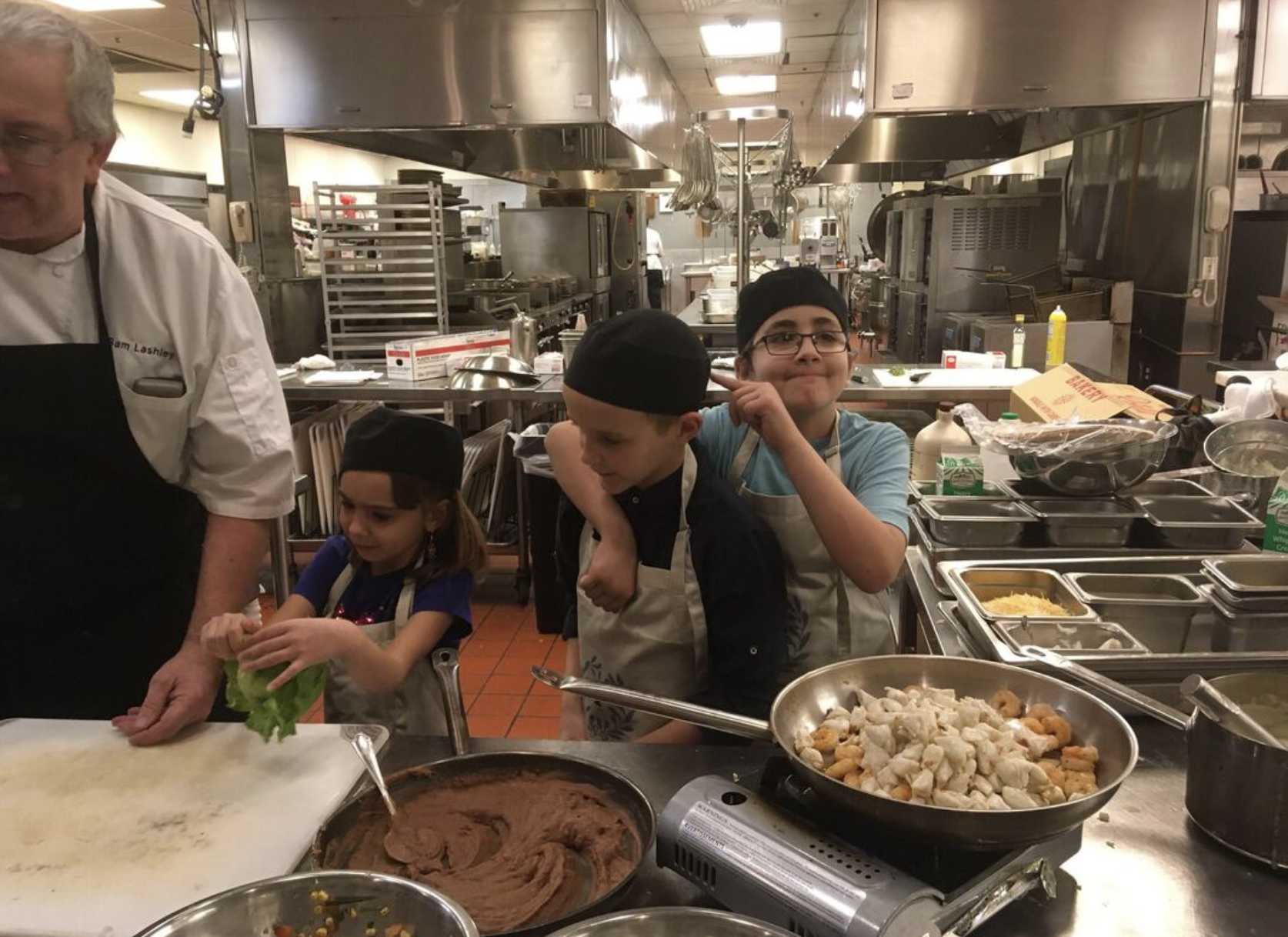 Kyle's first cooking lesson is under his belt! - Connecting Champions